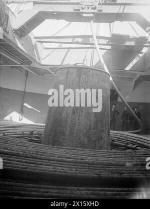 LAYING THE 17TH "PLUTO". 24 MAY 1945, ON BOARD THE CABLE LAYING SHIP ...