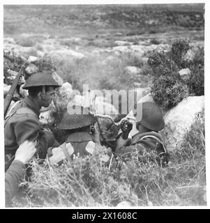 A GREEK ARMY IN TRAINING - A machine gun section in action , British ...