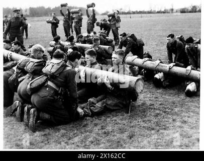 TOUGHENING UP - Finally the men are given exercises with heavy logs to ...