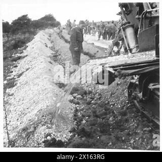 ROYAL ENGINEERS EXERCISE "SUSSEX" - A Trencher making drainage ditch at ...