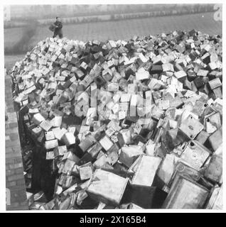 ARMY SALVAGE - A huge dump of petrol cans ready to be dealt with ...