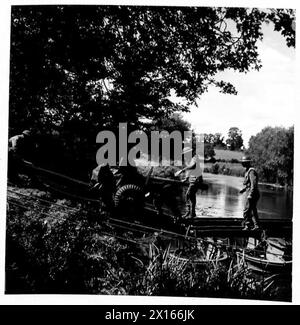 ERECTION OF A CLASS 5 RAFT. - An Anti-Tank gun being manhandled to the ...