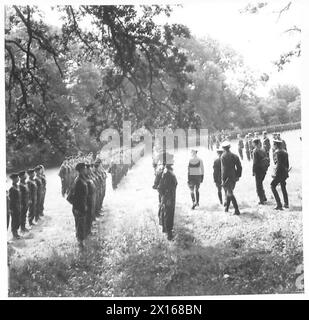 The King inspects the 64th Field Regiment of the Royal Artillery during ...