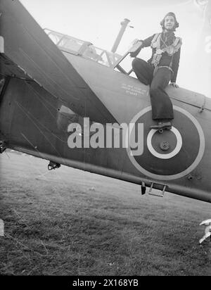 Fleet Air Arm Wren radio mechanics rig and test aircraft aerials at HMS ...