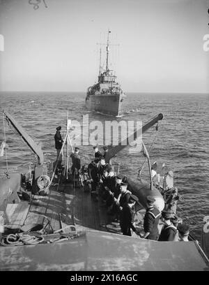 SCENES ON BOARD A MINESWEEPER. 1940, ON BOARD HMS HAZARD. - The gun's ...