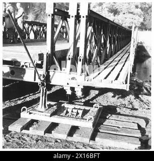Construction of a Bailey Bridge by British Army engineers is underway ...