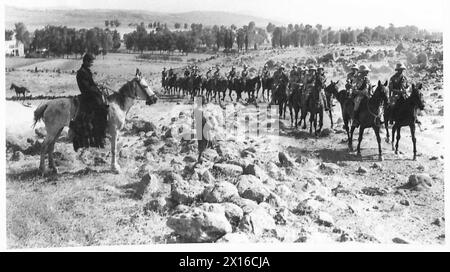 MOUNTED TROOPS IN PALESTINE - A troop on the march in picturesque ...
