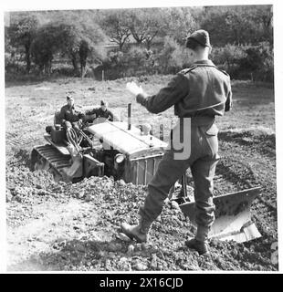 ARMY MOTOR TRACTOR SCHOOL - The bulldozer climbing the bank , British ...