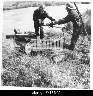 IMPROVISATION - Unloading the mortar from the raft , British Army Stock ...