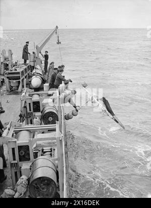 In July 1945, a British Algerine-class minesweeper operated with a ...