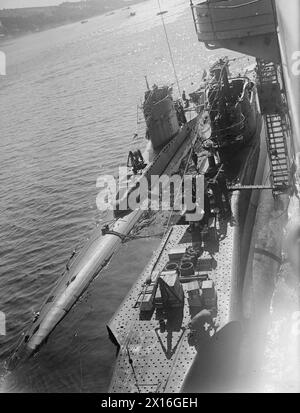 BRITISH SUBMARINES PREPARE FOR PATROL. 18 JULY 1943, HMS FORTH, HOLY ...
