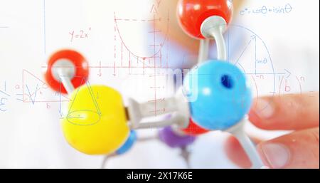 Image of mathematical formulae over scientist Stock Photo - Alamy
