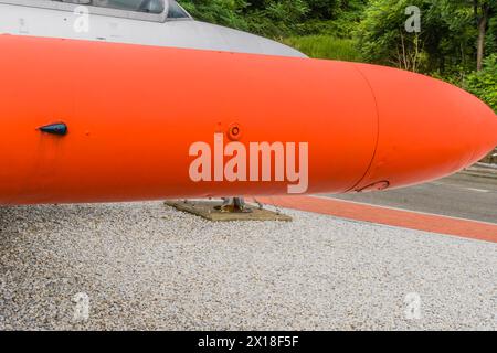 Closeup of wingtip fuel tank on small jet engine trainer on display at ...