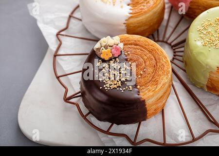Round croissants with filling and glaze, trendy dessert idea Stock ...