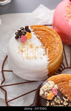 Round croissants with filling and glaze, trendy dessert idea Stock ...