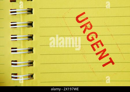 Red URGENT word stamp on a white paper Stock Photo - Alamy