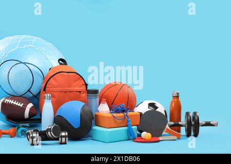 Many dumbbells on light background with space for text Stock Photo - Alamy