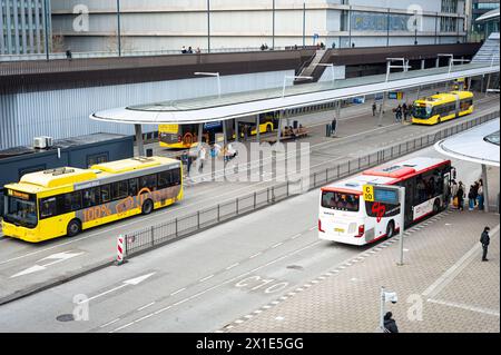 UTRECHT - Passengers are waiting for the bus at the bus station of ...