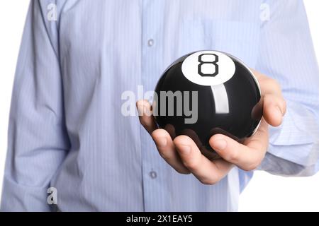 Man holding magic eight ball on white background, closeup Stock Photo ...