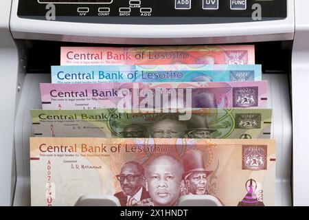 Lesotho money - Maloti in a counting machine Stock Photo - Alamy