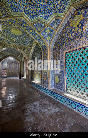 Elaborate tilework on walls and ceiling of the iwan at the entrance to ...