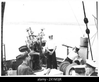 BRITISH TROOPS ON WAY AND ARRIVAL AT CRETE - Watchful anti-aircraft gun ...