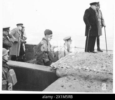 The Prime Minister inspects his former battalion while walking around a ...