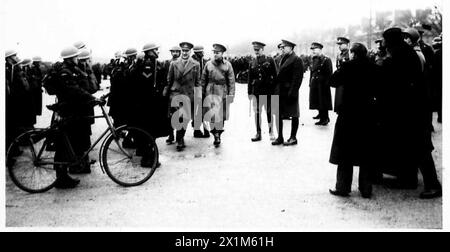 General Sir John Dill inspects parachute troops and engages with an ...