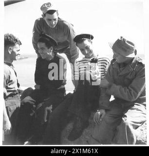 British and American soldiers cooperate on a hillside near Artena ...