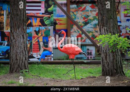 plastic pink flamingo bird , decorative element in a garden Stock Photo ...