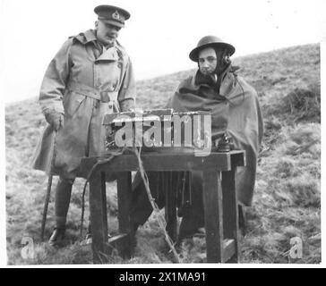 EXERCISES IN SCOTLAND - The Divisional Commander takes a peep through ...