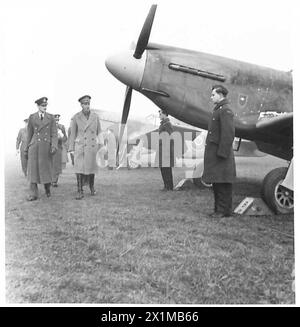 GOC SOUTHERN COMMAND VISITS MUSTANG SQUADRON - An ack-ack gun pit is ...