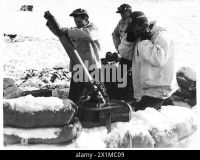 FIFTH ARMY : MORTARS IN ACTION IN SNOW - Troops drsssed in duffle coats ...