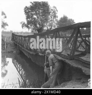Royal Engineers of the British Army construct a bridge using pile ...