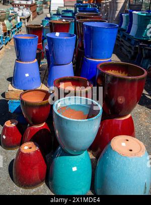 Large empty planters in a nursery Stock Photo - Alamy