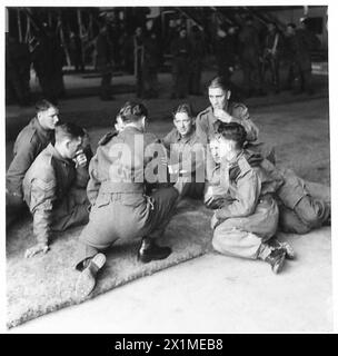PARATROOPS IN TRAINING - RAF instructor teaching recruit to turn ...