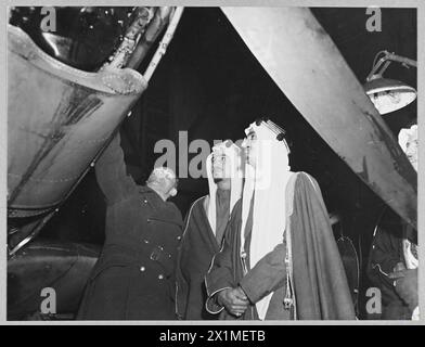 ARABIAN PRINCES VISIT RAF FIGHTER STATION - Emir Feisal (left), his ...