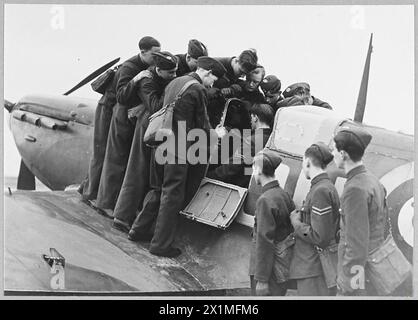 AIR TRAINING CORPS CADET UNDER INSTRUCTION - A.T.C. Cadets clambering ...