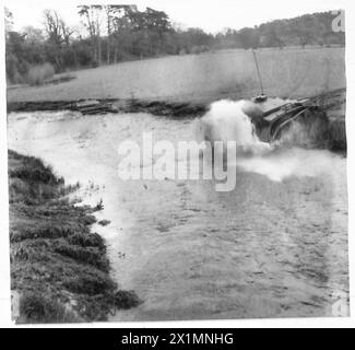 Cruiser tanks of the British Army cross a river during an exercise ...