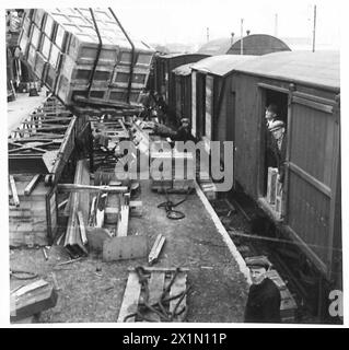 LOADING COMPO PACKS INTO SHIPS - Compo packs being loaded into a ship ...
