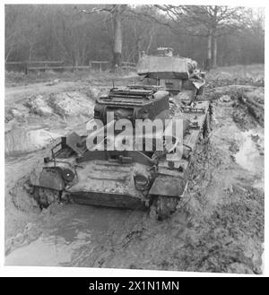 TESTING TANKS IN MUD - A Valentine tank towing a Cruiser Mk. IV through ...