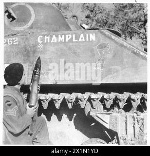 A sergeant of the British Army points out the 'Afrika Korps' sign ...