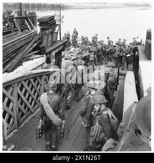 Canadian troops embark in landing craft during combined operations ...