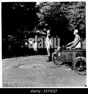 TANKS HAVE SPECIAL POLICE - Police guiding a Covenanter tank into the ...
