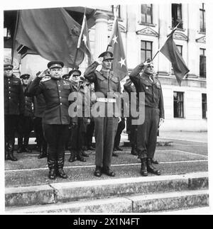 Russian troops march past a saluting base in Vienna during a parade ...