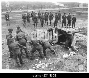 Battery Commander in a British Army observation post monitors artillery ...