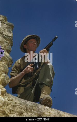 Corporal M Smith of the Duke of Cornwall's Light Infantry stands with ...