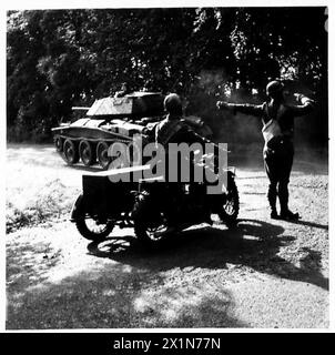 TANKS HAVE SPECIAL POLICE - Police guiding a Covenanter tank into the ...