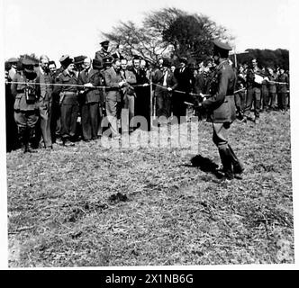 Members of Parliament observing army battle training while the School ...