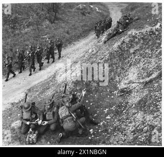AN INFANTRY ASSAULT EXERCISE - A trench mortar section in action ...